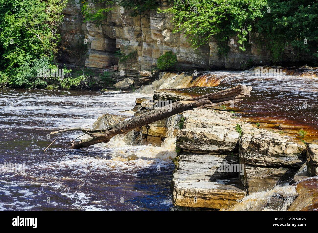 A scenic view of the cascading waterfalls of the River Swale at ...