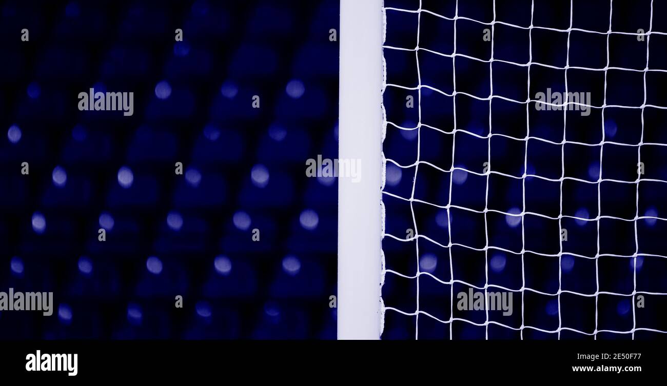 The soccer field view through white square gate net. Football sport ...