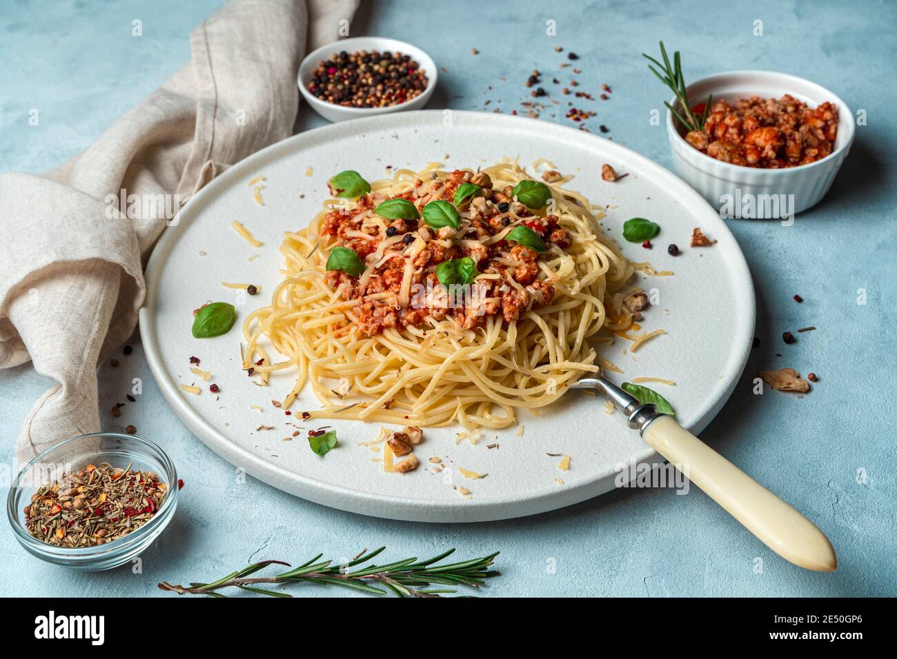 Spaghetti with bolognese pasta seasoned with basil, nuts and cheese on ...