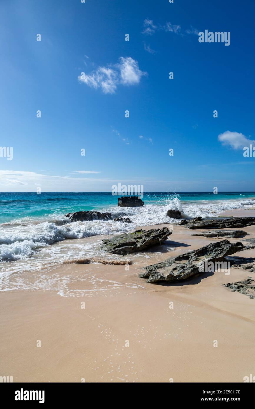 Rocks on the sand, at Elbow Beach on the island of Bermuda Stock Photo ...