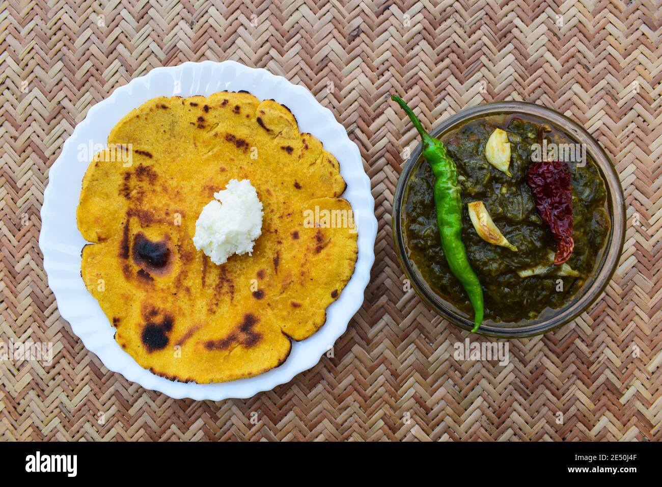 Indian popular dish makki di roti and Sarson da saag, mustard leaves ...