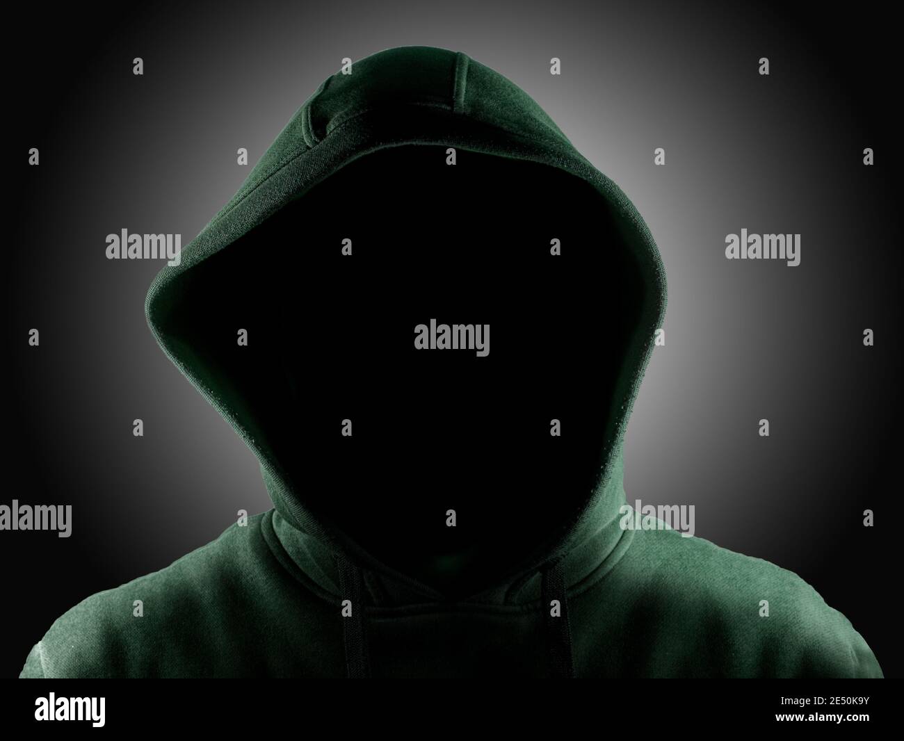 Anonymous hacker in black hoodie hi-res stock photography and images ...