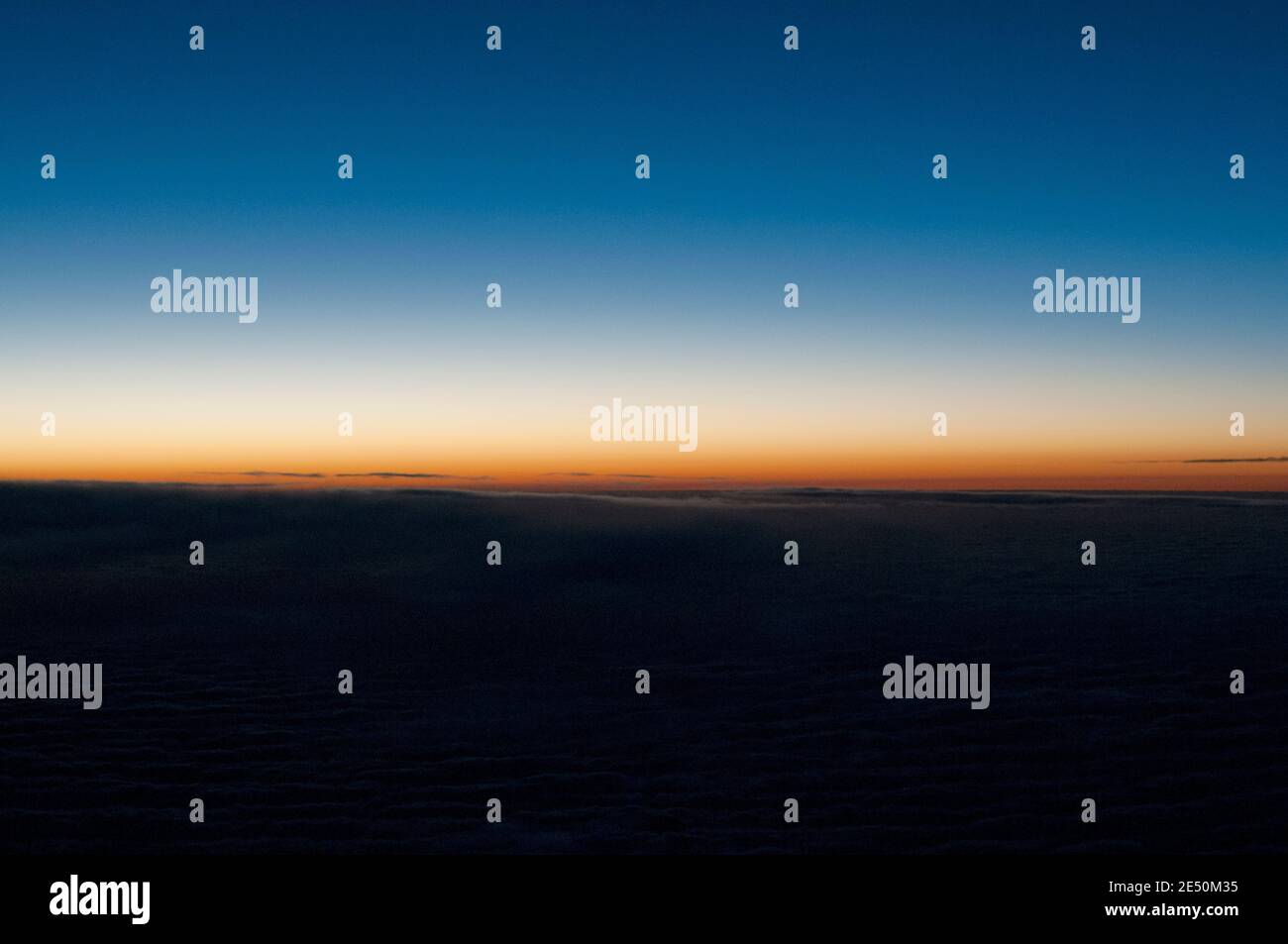 Aerial view of the late evening sky as seen from high altitude, with ...