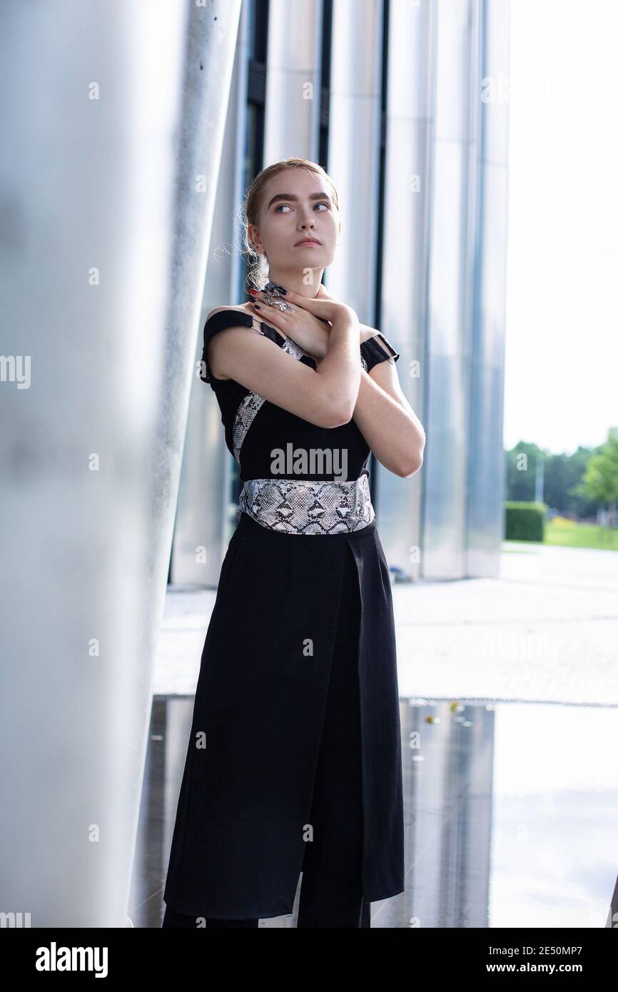 Young white model girl with city building background Stock Photo - Alamy
