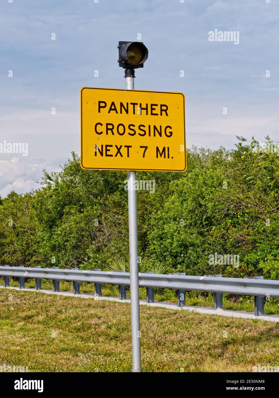 Cougar road crossing warning sign hi-res stock photography and images ...