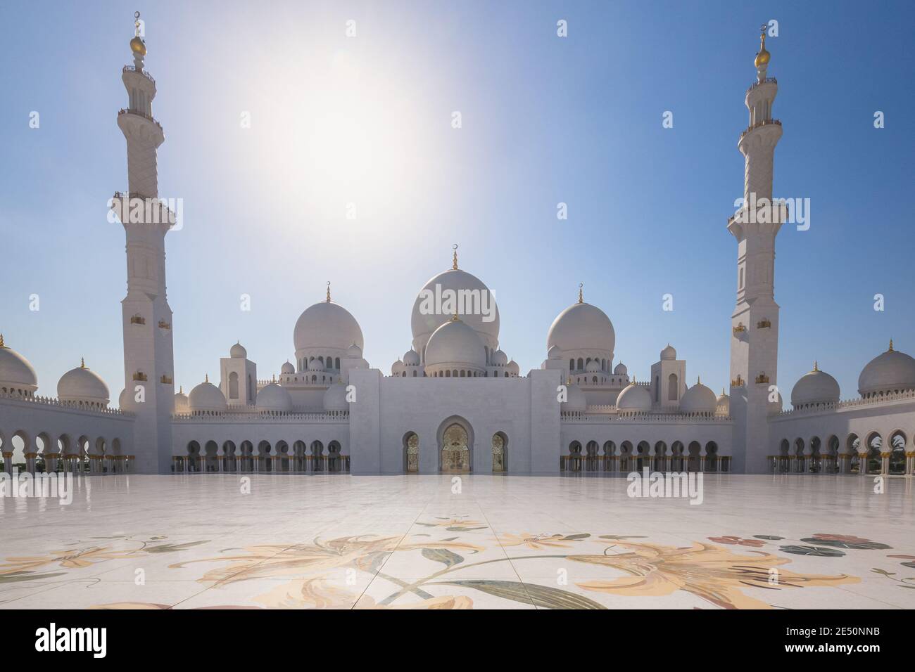 An empty courtyard with no people and exterior view of the Sheikh Zayed ...