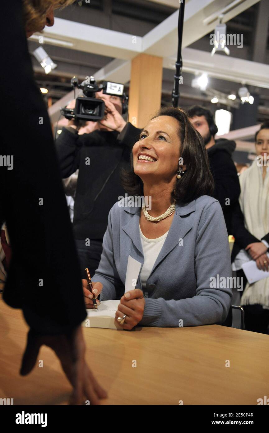 French socialist figure Segolene Royal signs copies of her book 'Ma ...