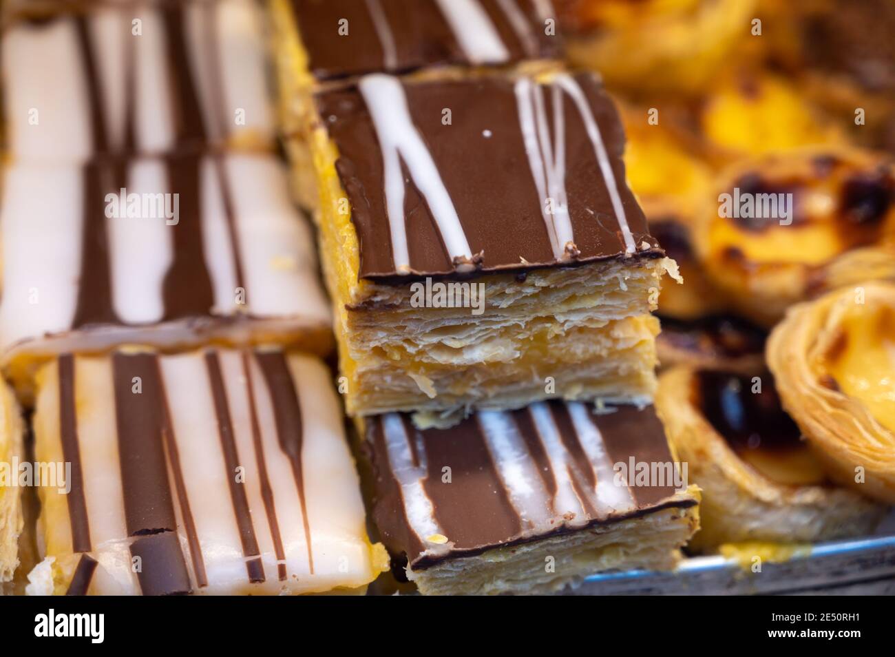 Traditional dessert pastry in Portugal, puff eggs cream cakes with ...
