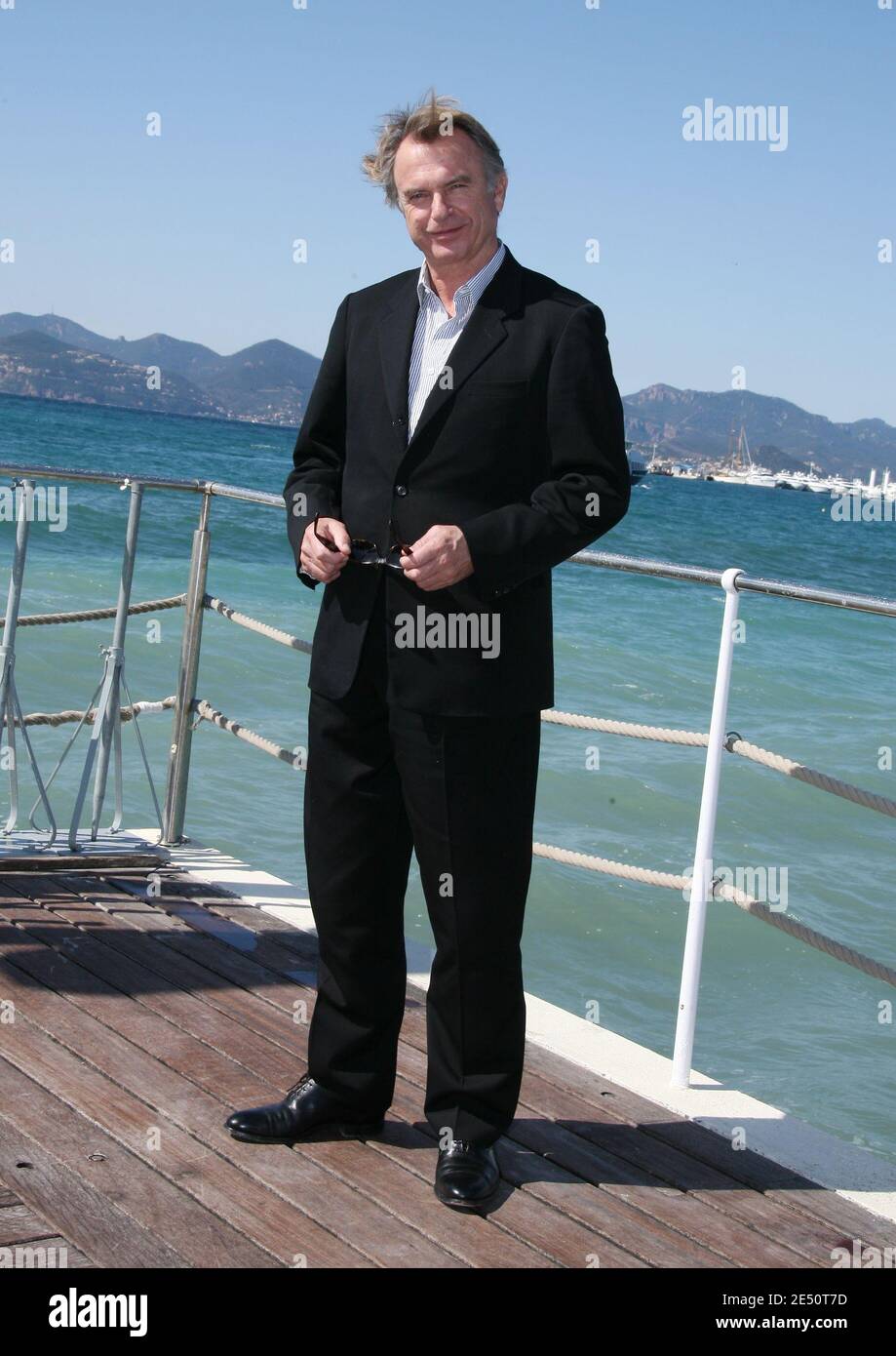 Actor Sam Neill poses at a photocall during the MIP TV Featuring Milia ...