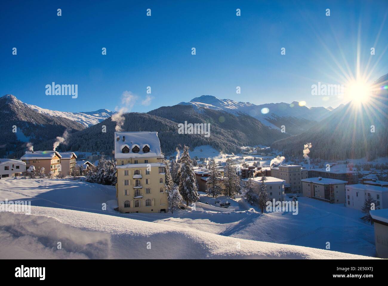Beautiful sunrise after heavy snowfall in the Swiss Mountains Alps at ...