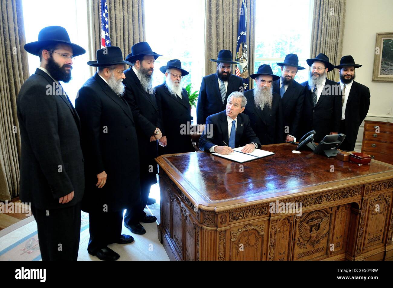 U.S President George W. Bush (C) is surrounded by ten Chabad Rabbis as ...