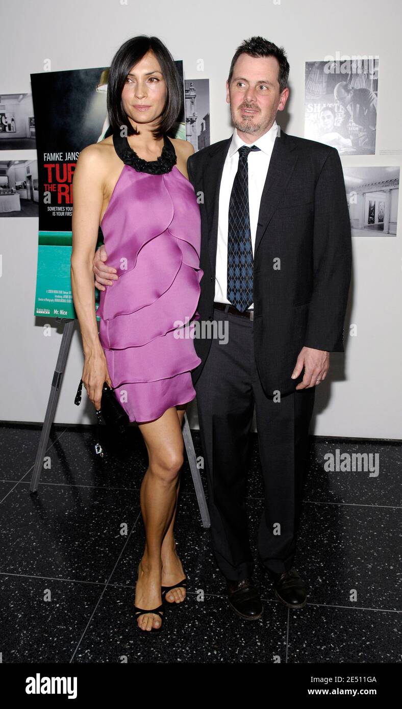 Star of the film Famke Janssen and director Chris Eigeman pose at the ...