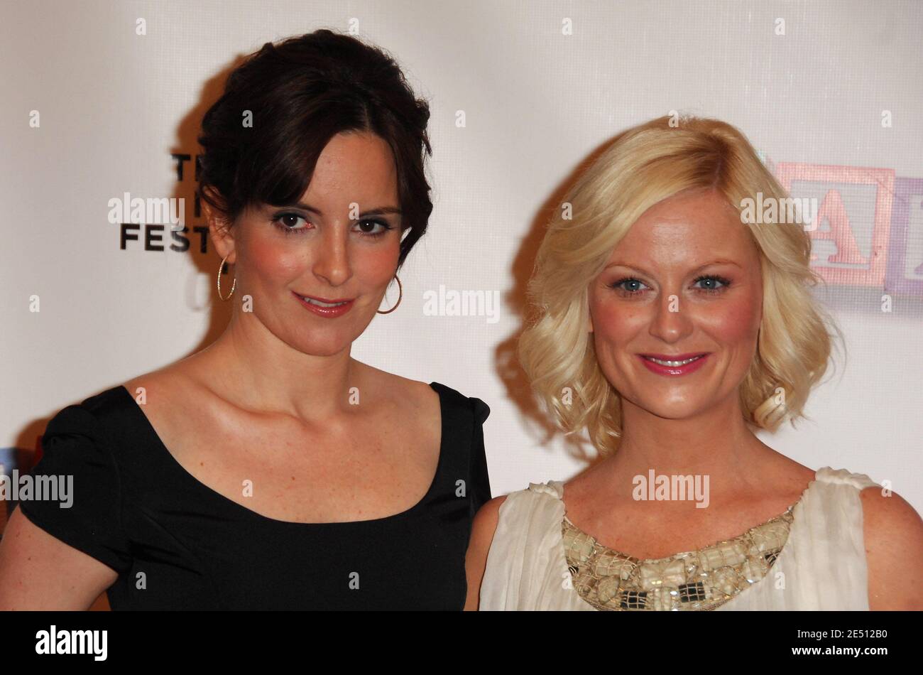 Actresses Tina Fey (L) and Amy Poehler arrive to the 'Baby Mama' premiere at the Ziegfeld ...