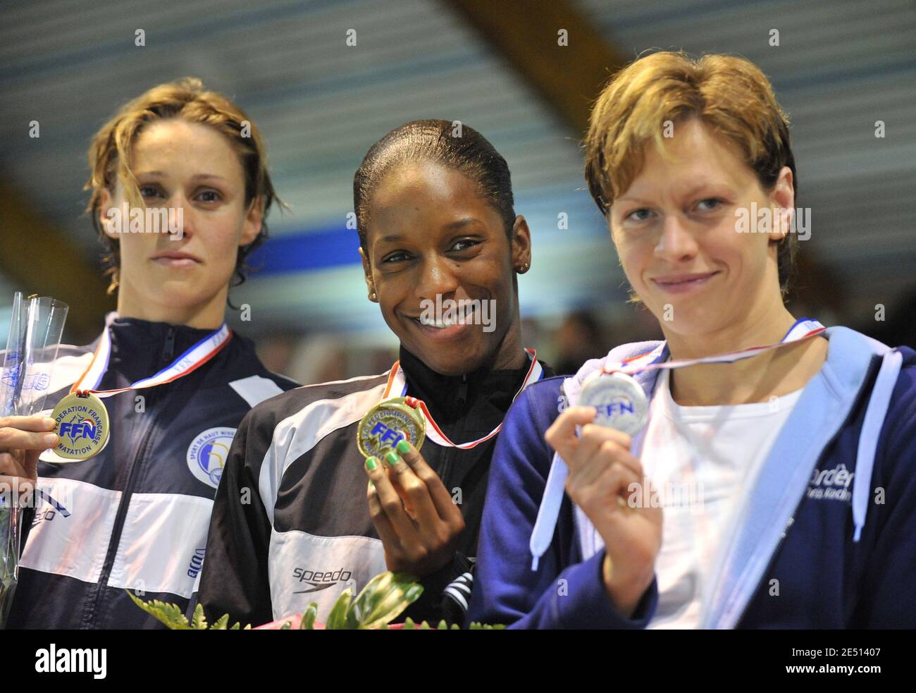 France's Malia Metella poses at the podium of the women's 100m final ...