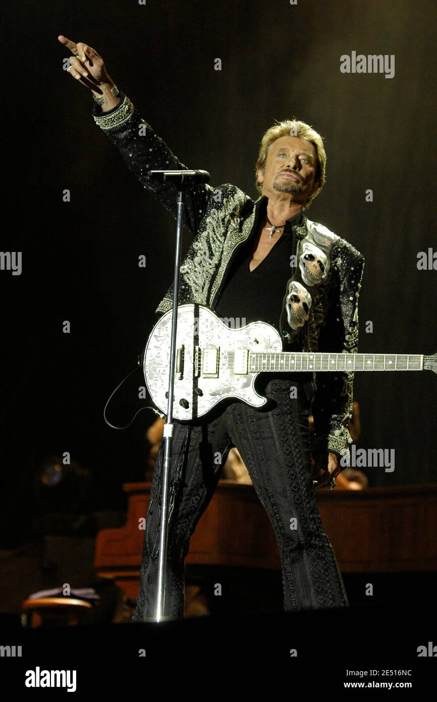 French singer Johnny Hallyday performs live on stage during 'Les ...