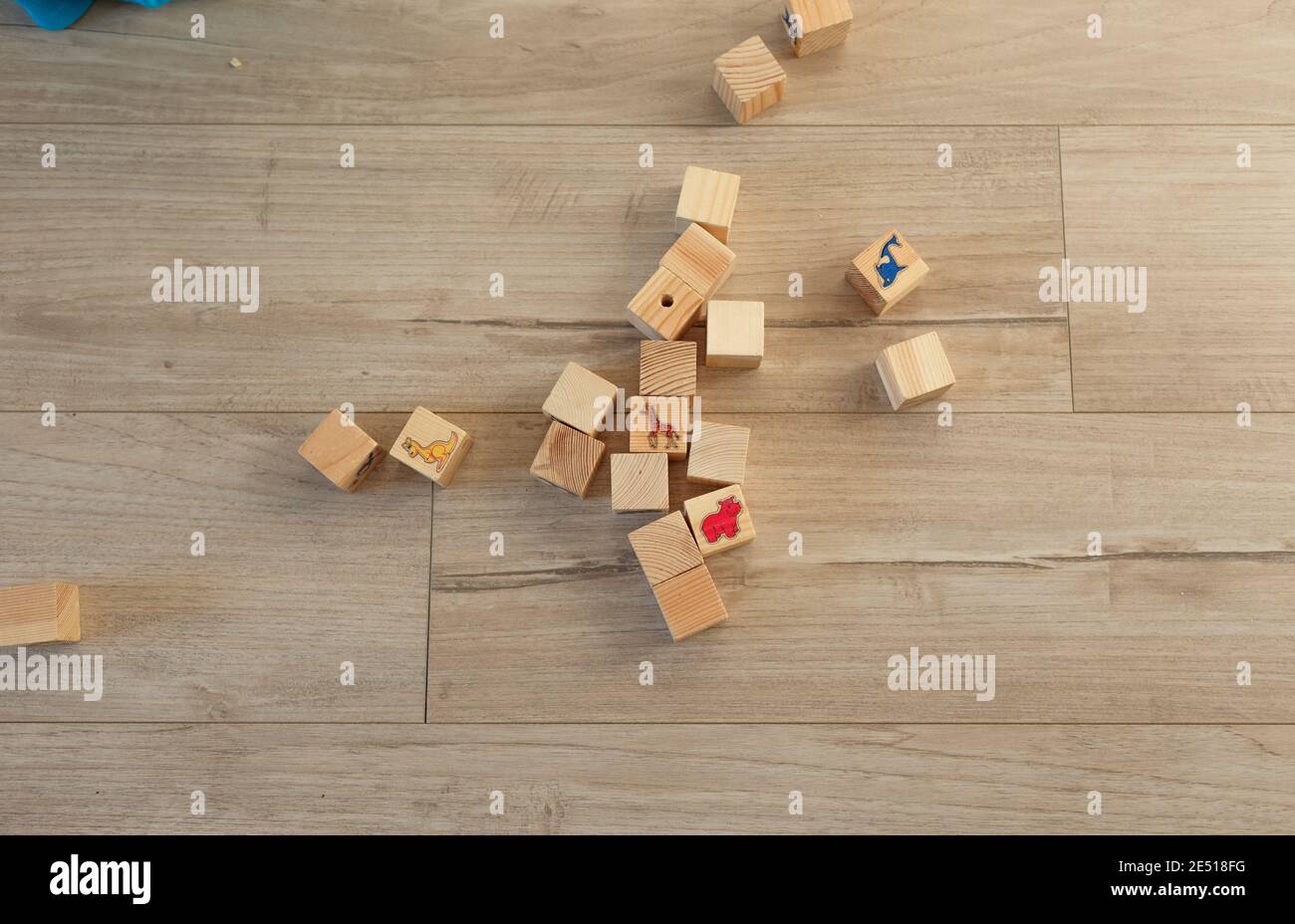 children's wooden blocks are scattered on the floor Stock Photo - Alamy