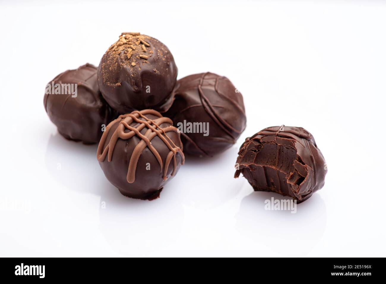 variety of handmade gourmet chocolate truffle candy isolated on white ...