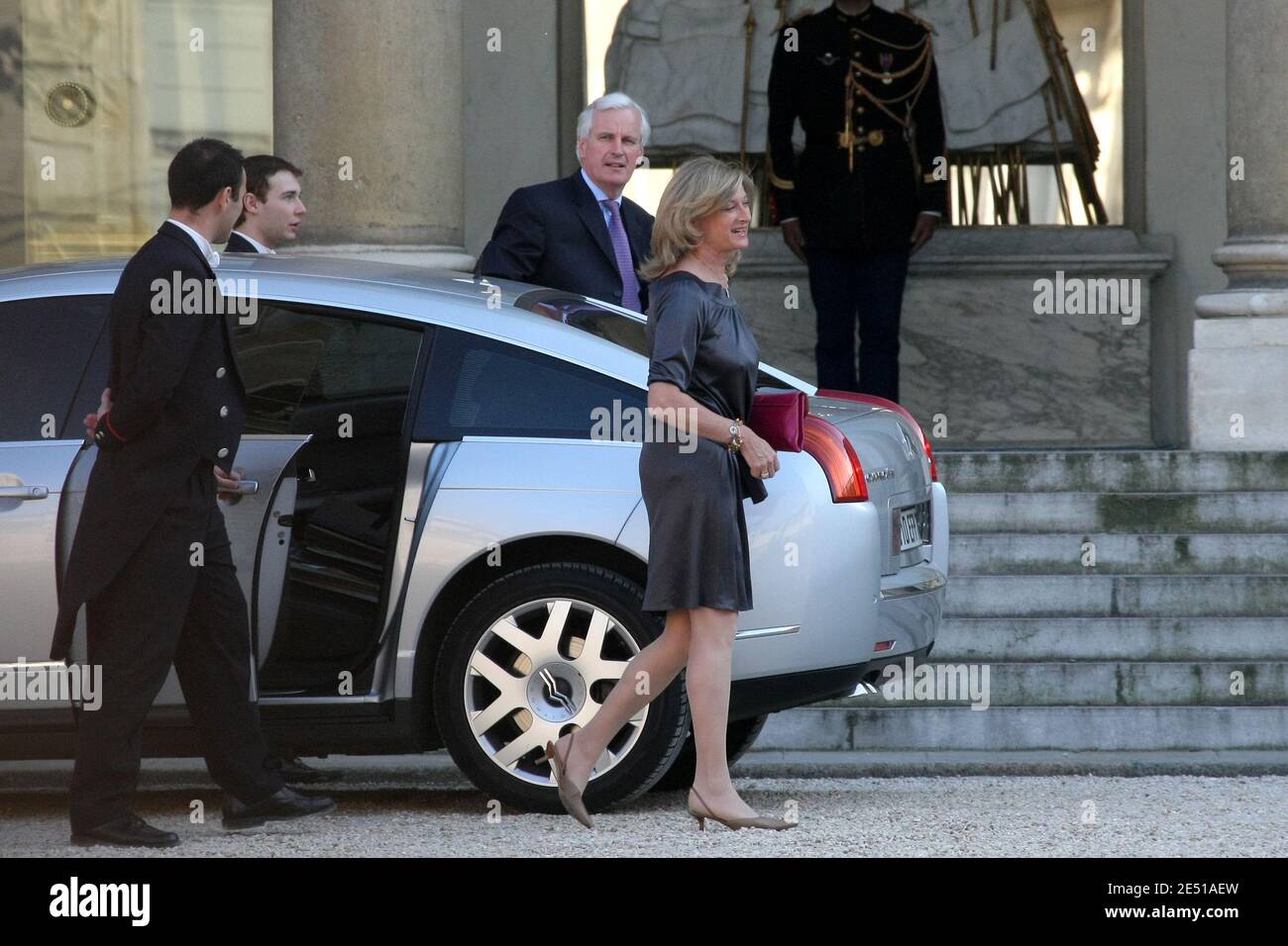 Michel Barnier arrives with his wife at the Elysee Palace in Paris ...