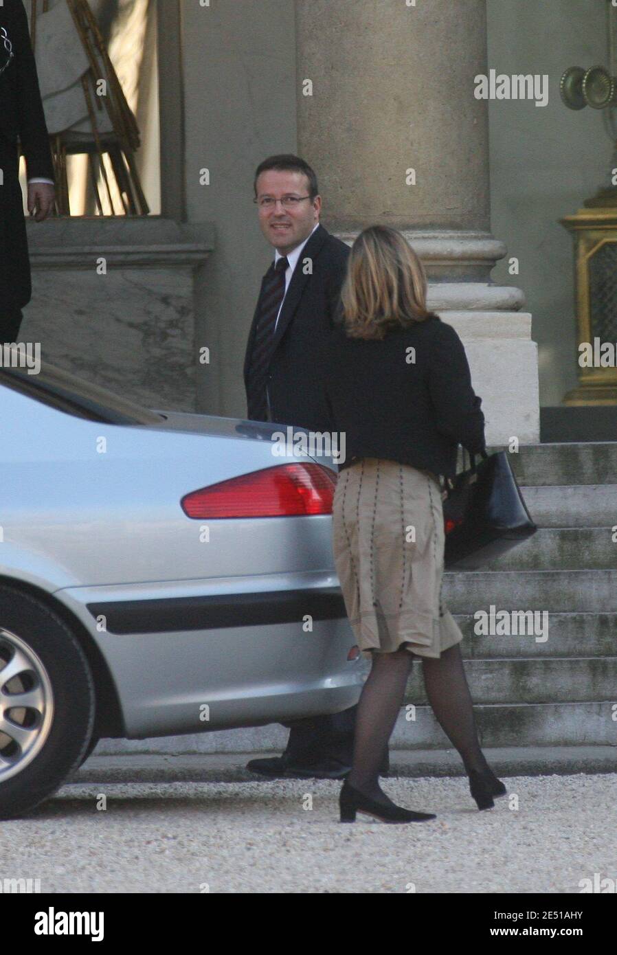 Martin Hirsch arrives with his wife at the Elysee Palace in Paris ...