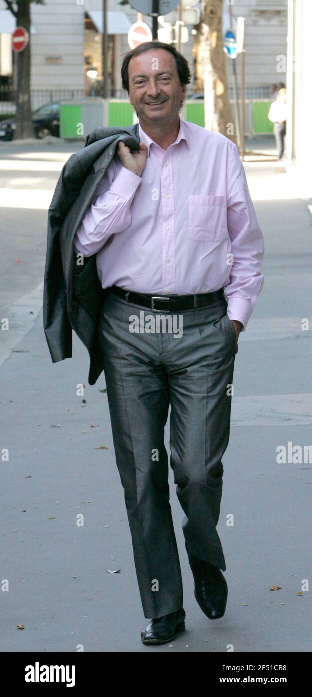 Chairman of Leclerc Supermarket Michel Edouard Leclerc strolling in ...