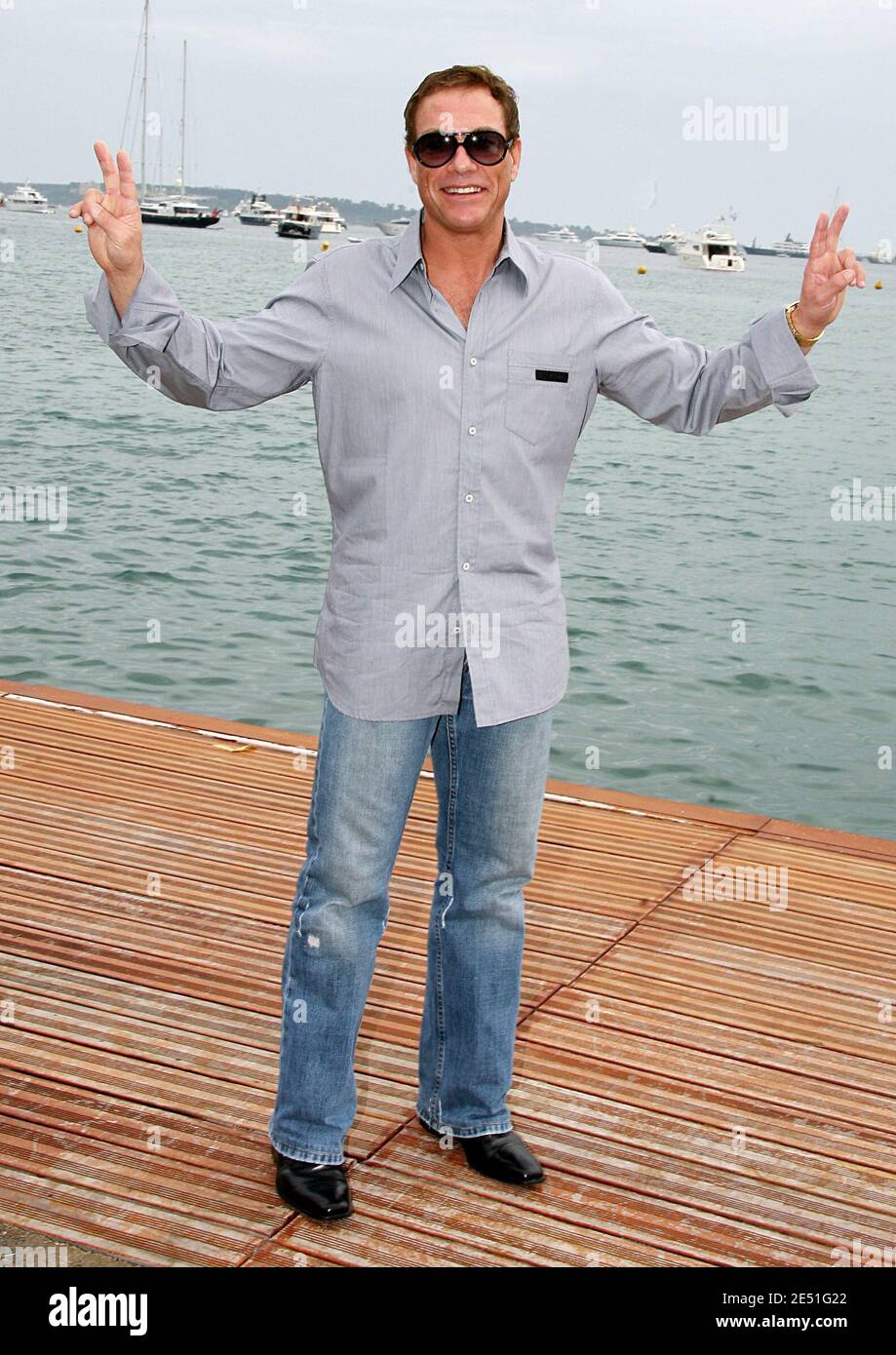 Actor Jean-Claude Van Damme poses for pictures at a photocall on ...