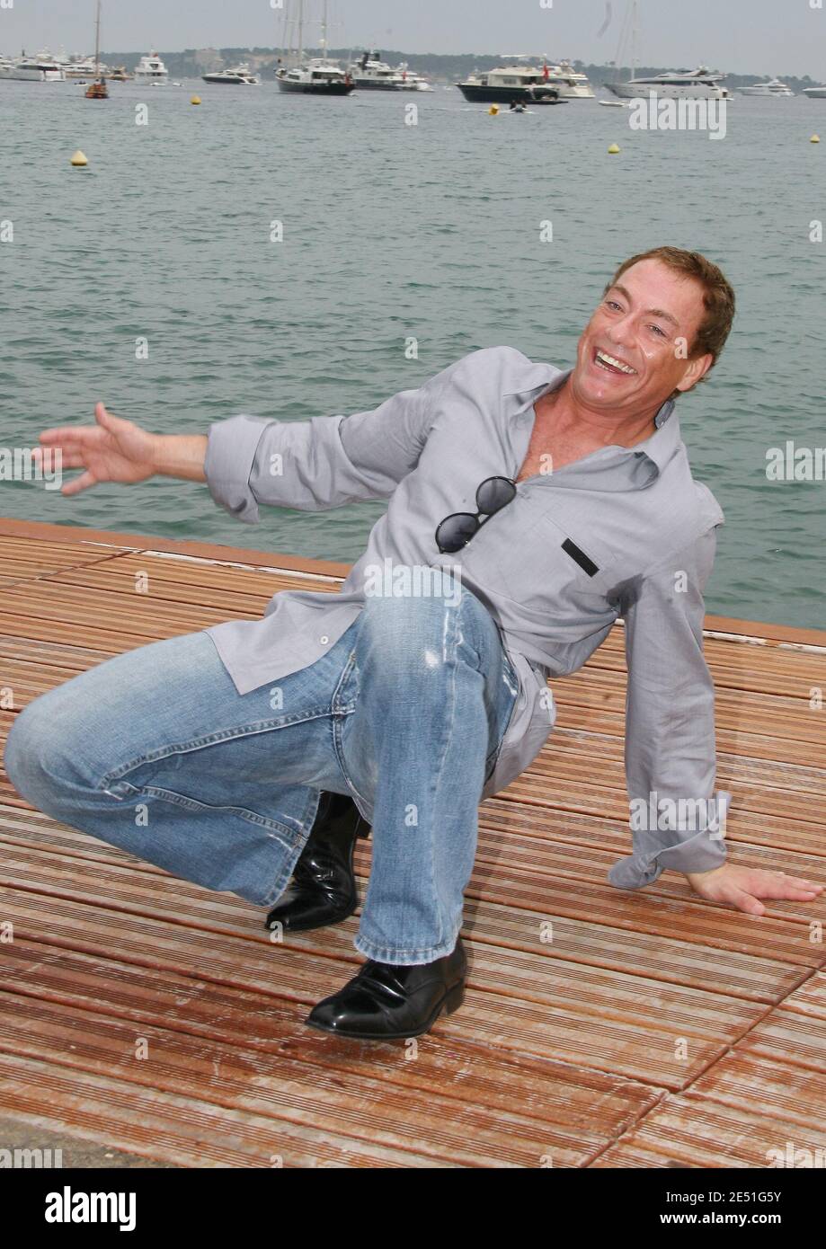 Actor Jean-Claude Van Damme poses for pictures at a photocall on ...