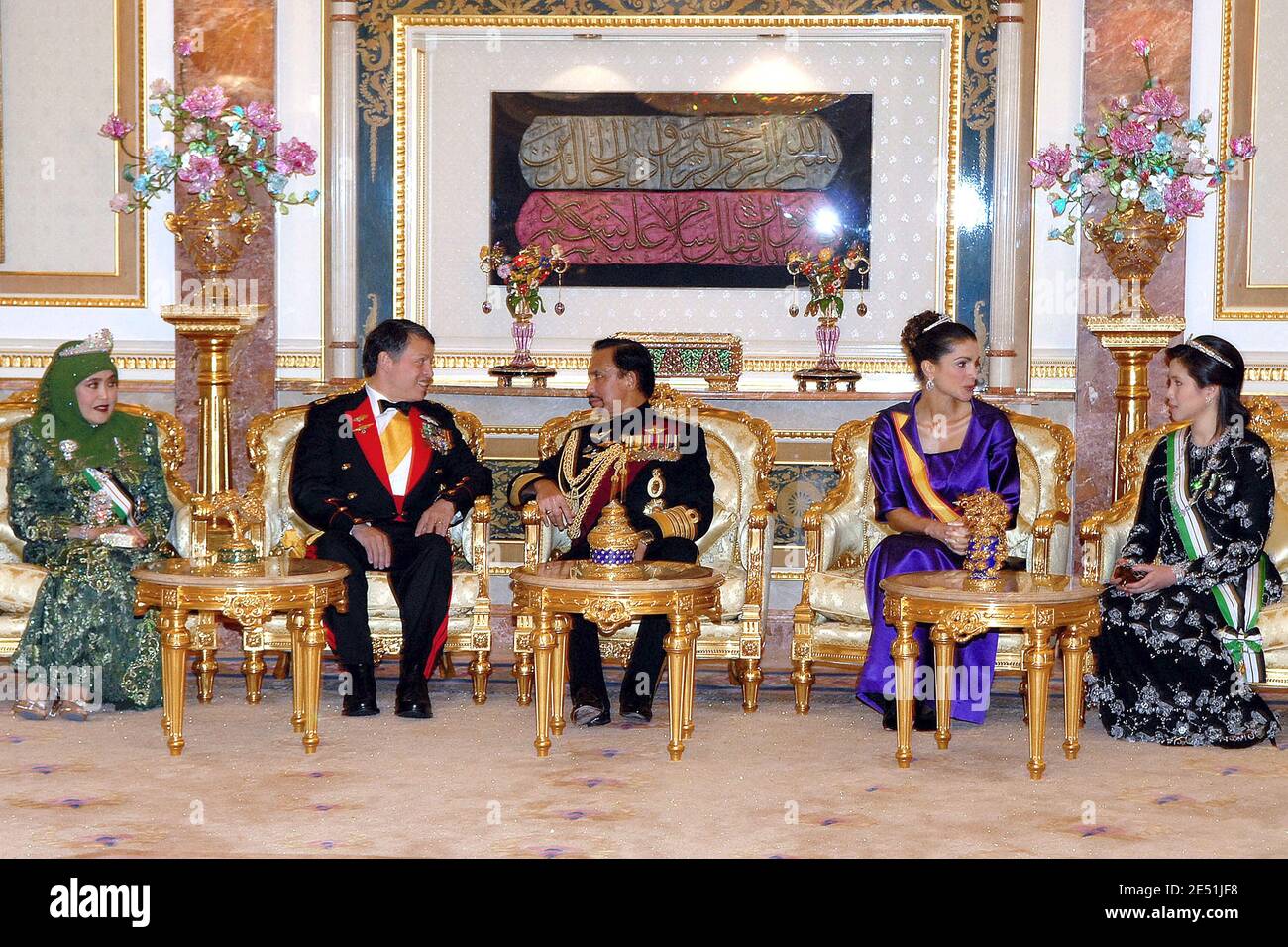 Brunei's Sultan Haji Hassanal Bolkiah and his two wives Queen Anak ...