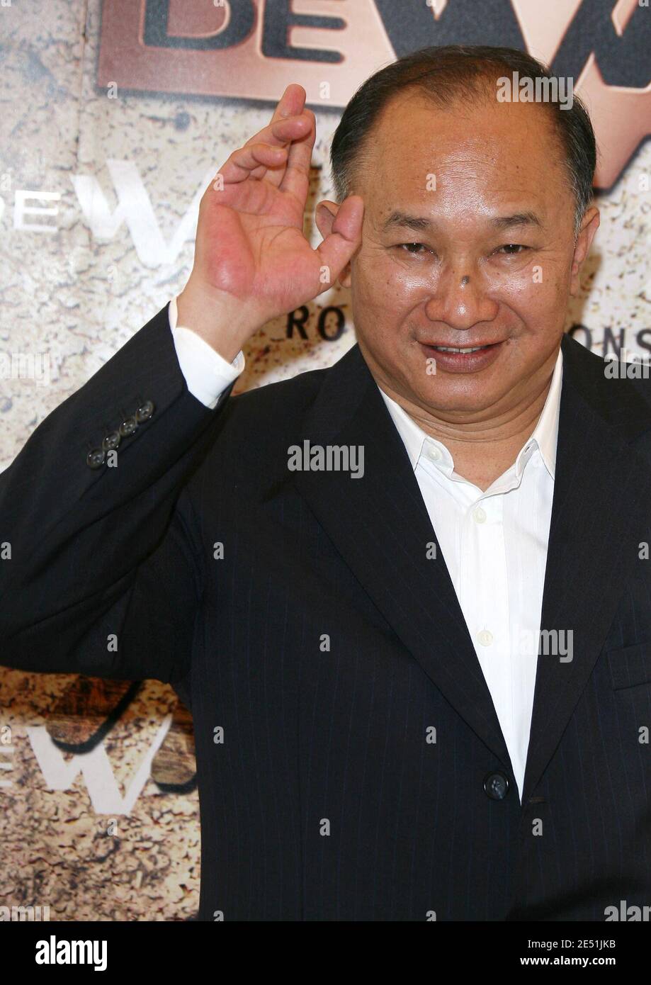 Director John Woo poses at a photocall for the film 'Red Cliff' during ...