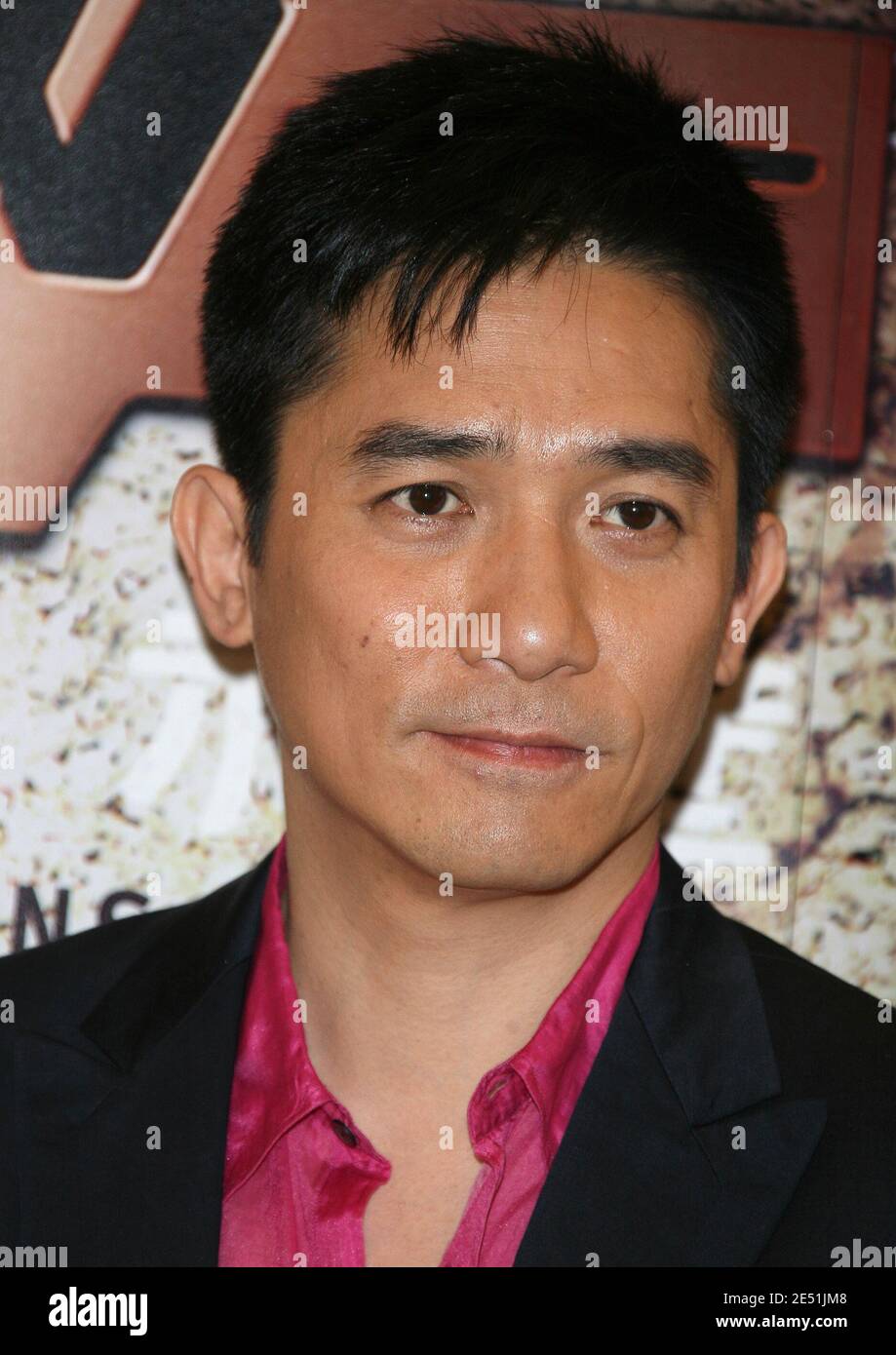Cast member Tony Leung poses at a photocall for the film 'Red Cliff ...