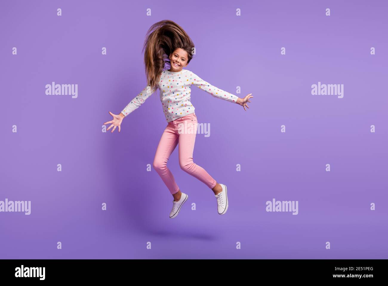 Full length body size photo playful careless laughing jumping throwing ...