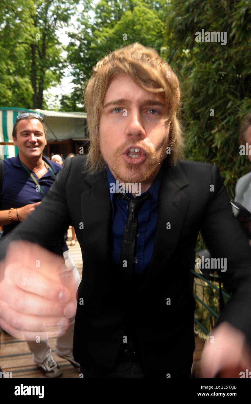 French singer Julien Dore arrives at the 'Village', the VIP area of the ...