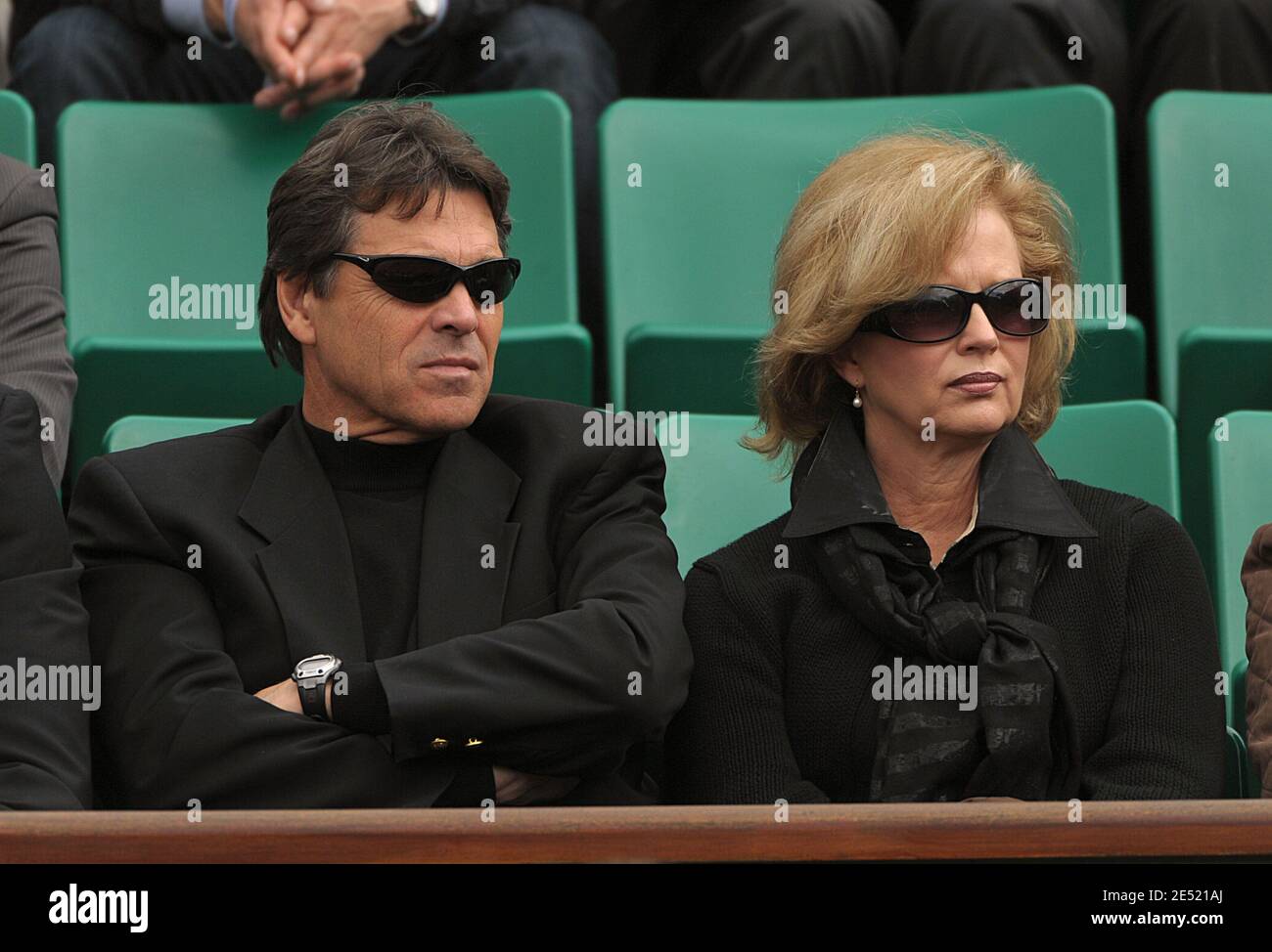 Texas govenor Rick Perry and his wife attend the Quarter of Finale of ...