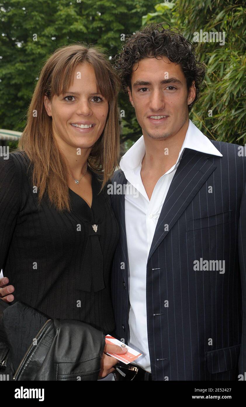 Laure Manaudou and her boyfriend arriving at the VIP area 'Le Village ...
