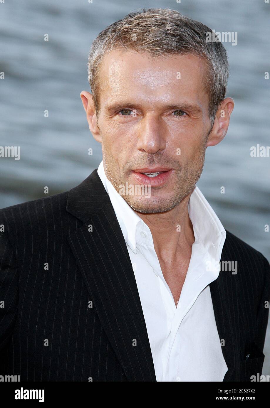 Lambert Wilson poses for photographers at a photocall on the beach as ...