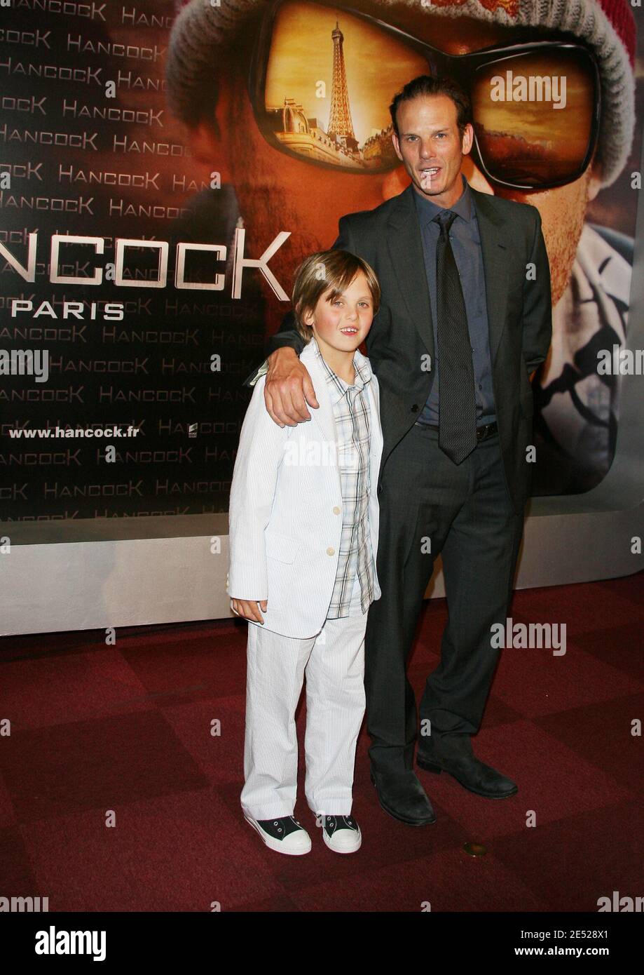Director Peter Berg and his son attending the French movie premiere of ...