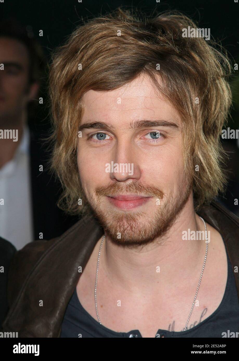Julien Dore poses for photographers during 75th birthday Lacoste party ...