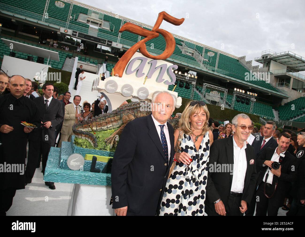 FFT President Christian Bimes and Michel Lacoste pose for photographers ...