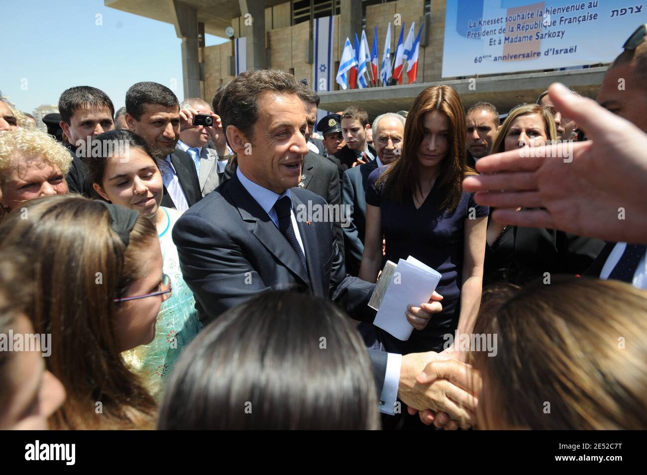 French President Nicolas Sarkozy and his wife, first lady Carla meet ...