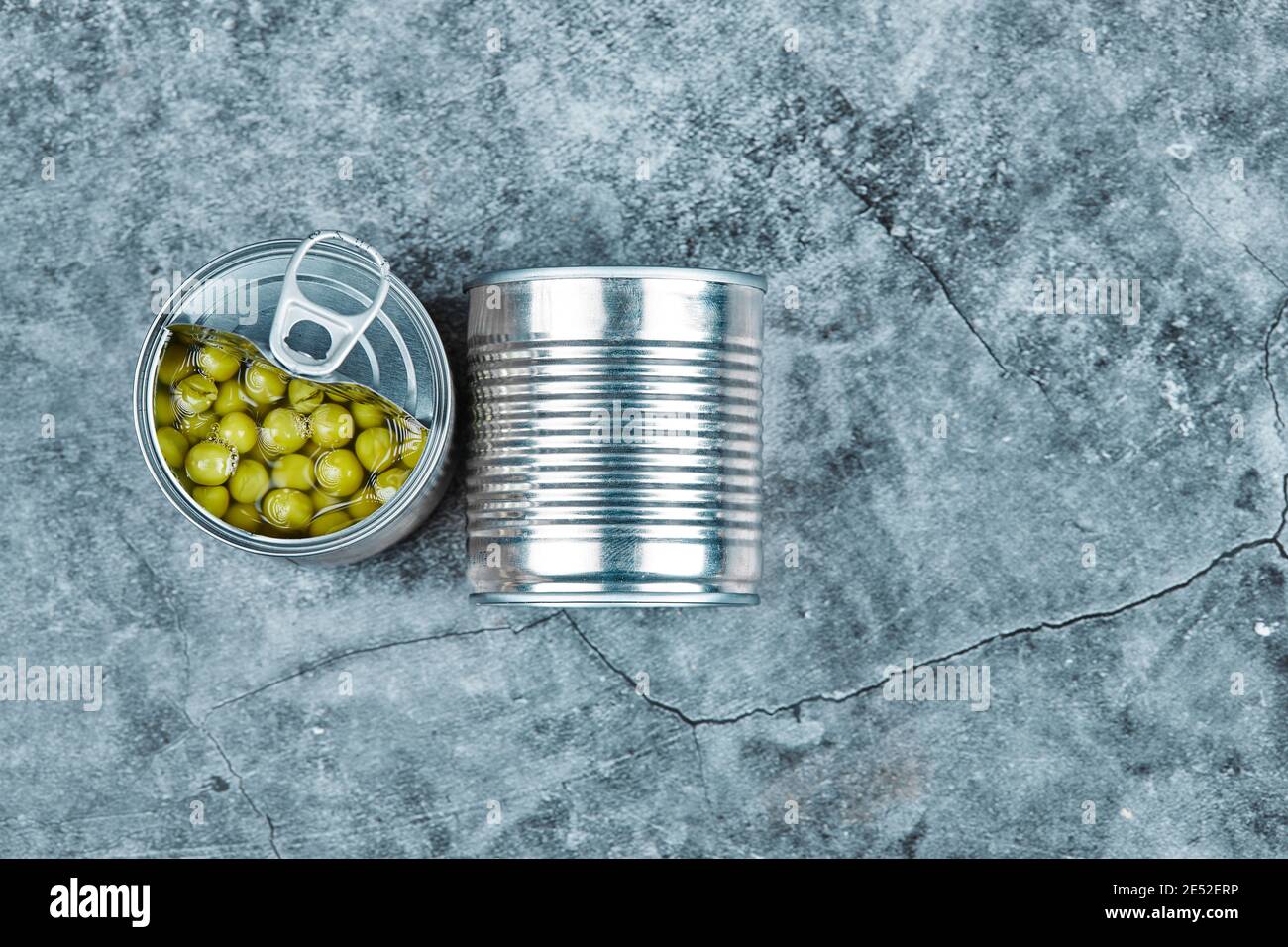 Marinated green pea beans in metallic cans Stock Photo - Alamy