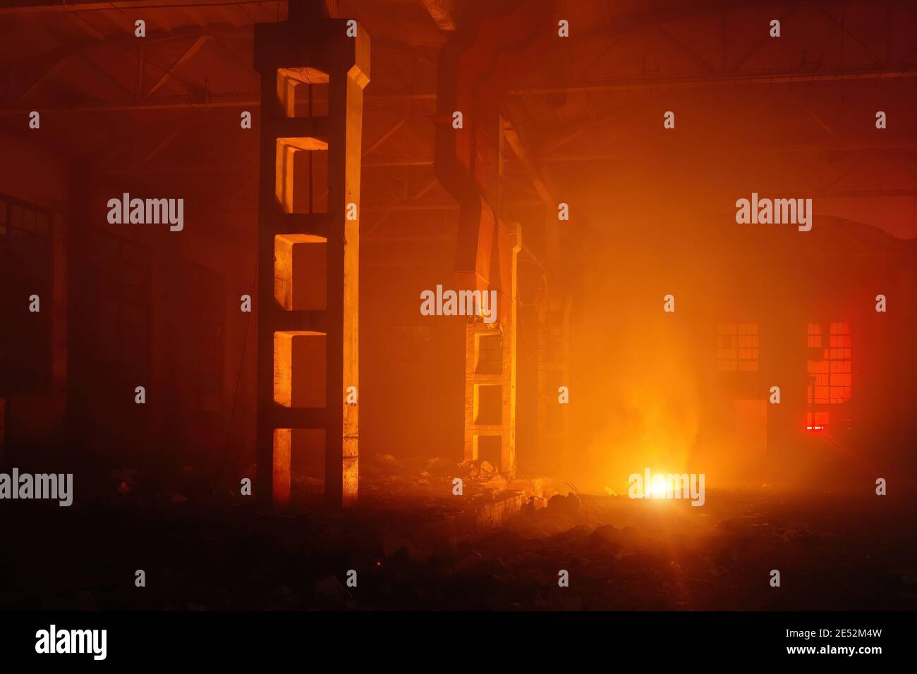 Fire in the factory. Burned by fire industrial building Stock Photo - Alamy