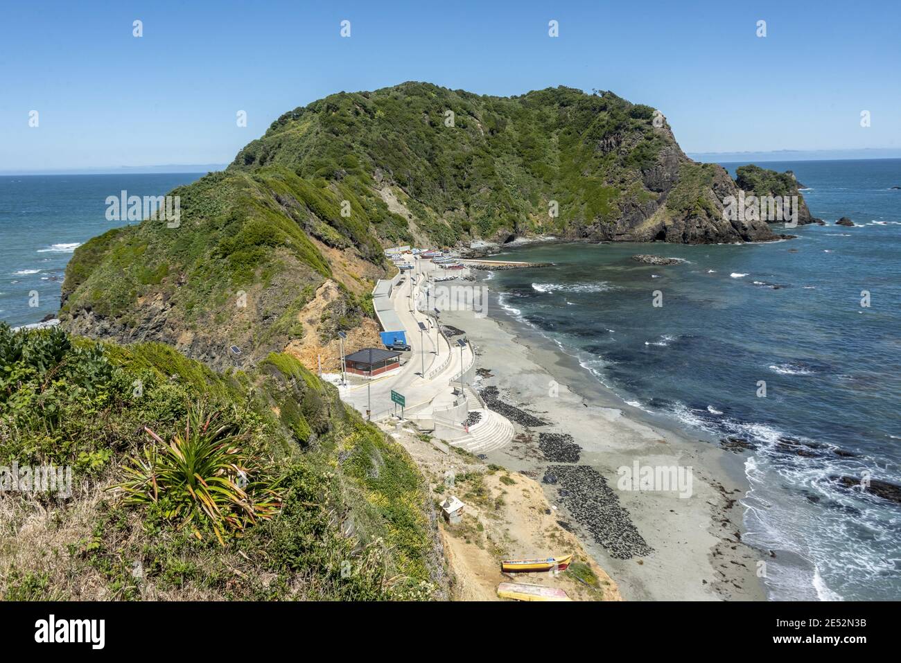 Mesmerizing landscape of a tropical beach among green cliffs Stock ...