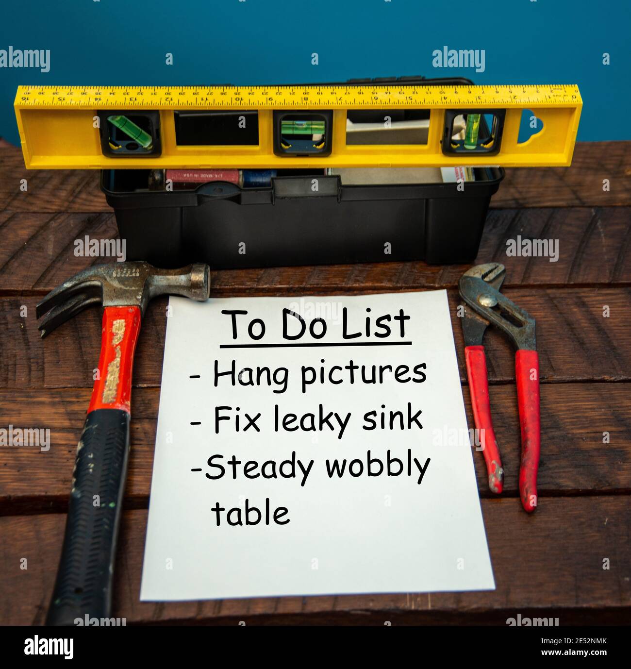 Toolbox with tools laid out on a table with white paper Stock Photo - Alamy