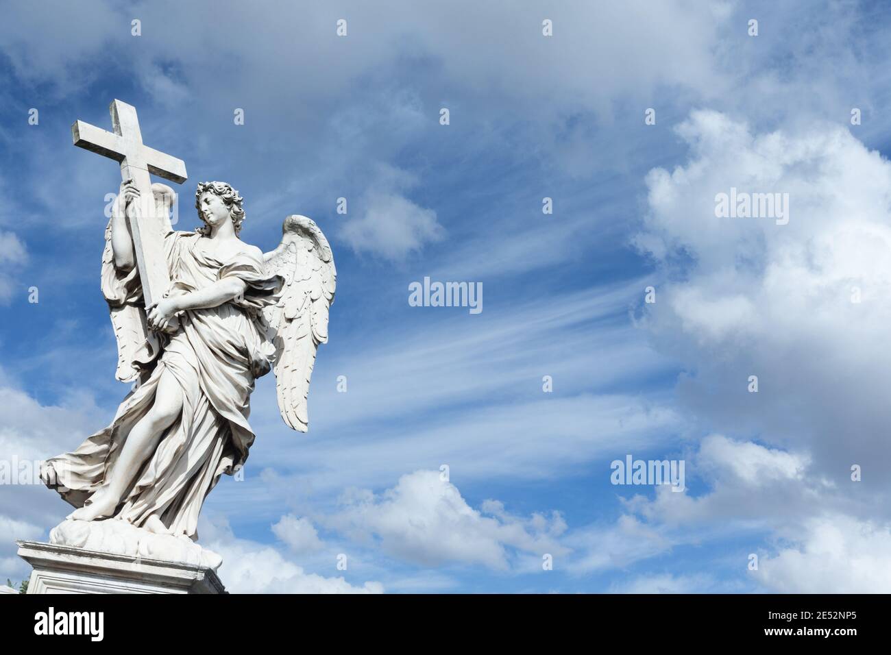 Italy Rome Angel with the Cross on St. Angelo Bridge against a cloudy ...