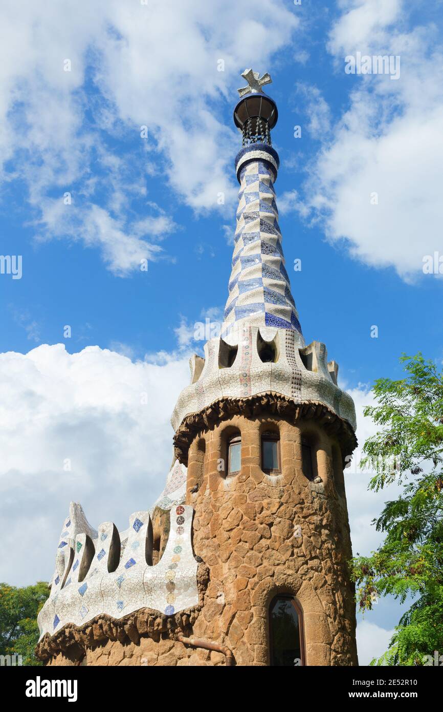 Entrance tower with spire in Park Guell designed by Antoni Gaudi Stock ...