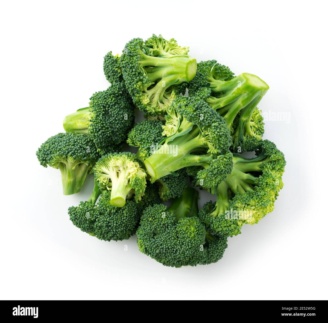 Cut broccoli placed on a white background. View from above Stock Photo ...
