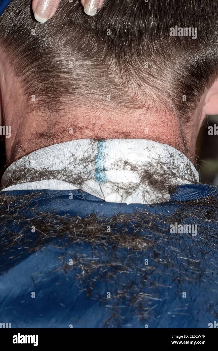 Portrait Barber styling hair Man in Barbershop Care Service. clean-cut ...