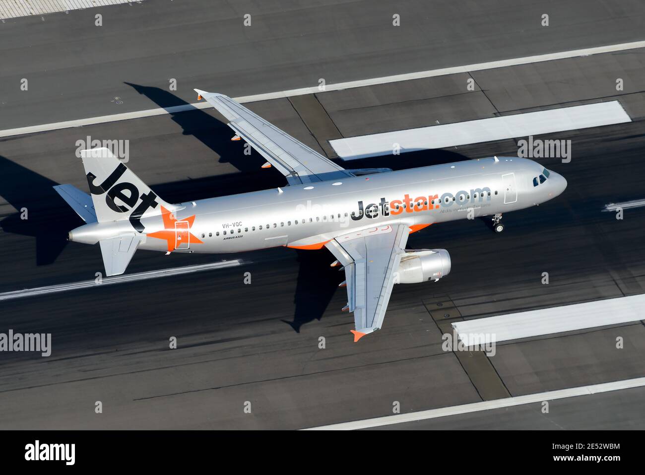 Jetstar Airways Australia Airbus A320 landing at Sydney Airport. Aerial ...