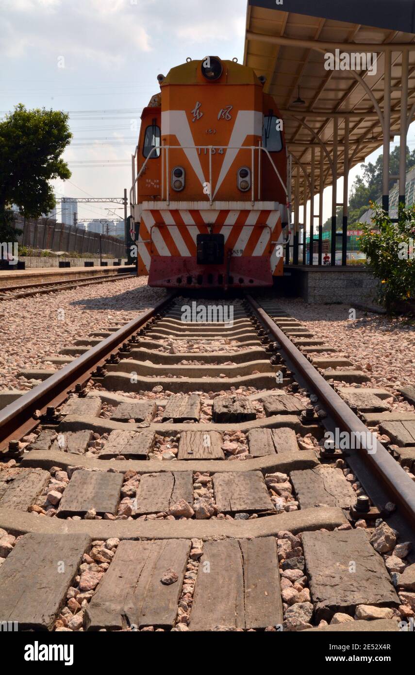 Old locomotive train and carriages in Shenzhen, China. Platform and ...