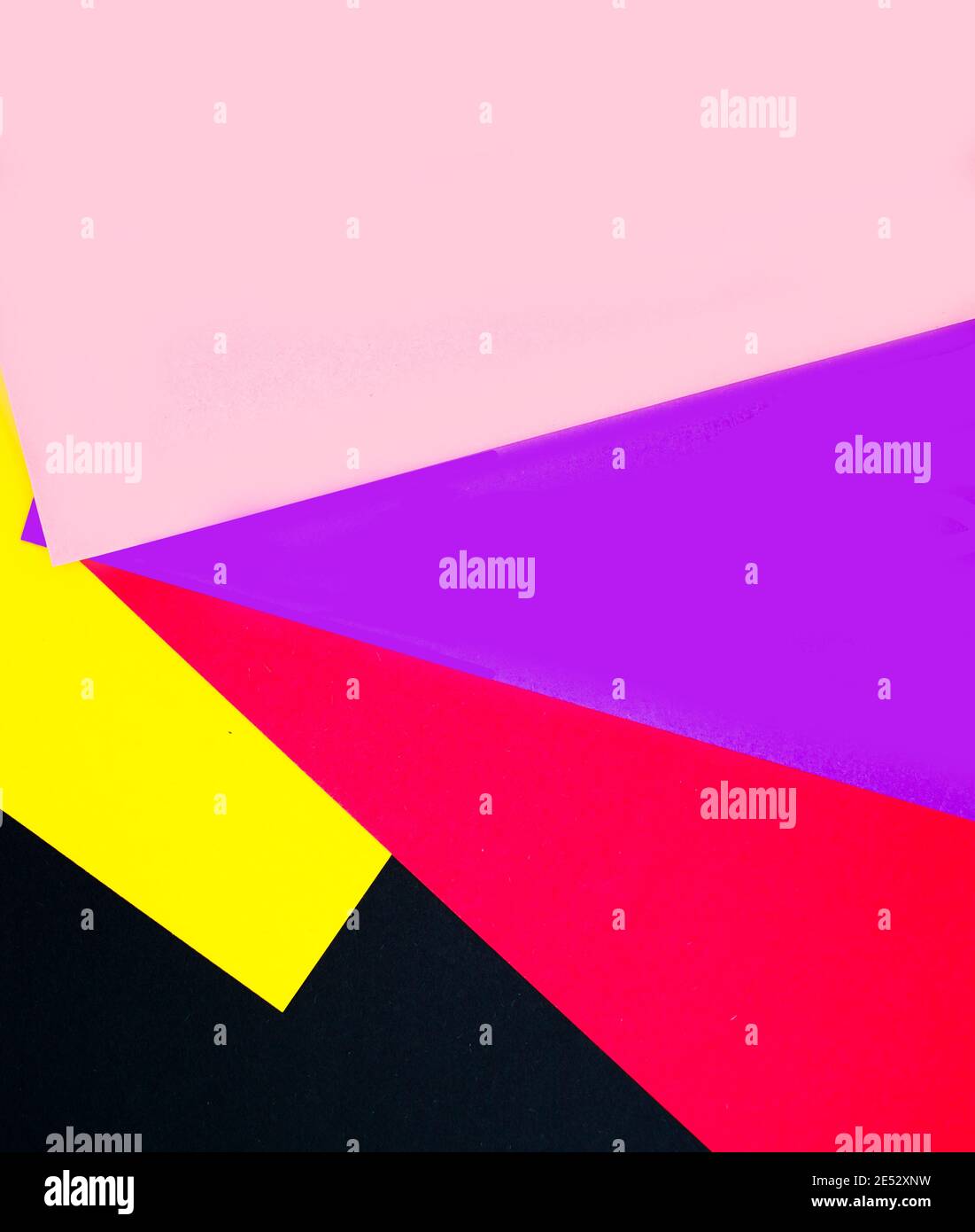 Construction paper background, pink, purple, red, yellow, and black ...