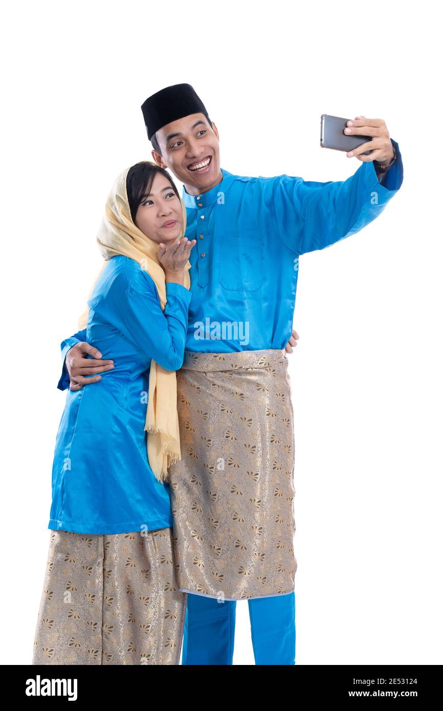 muslim couple talk to family using smartphone isolated over white ...